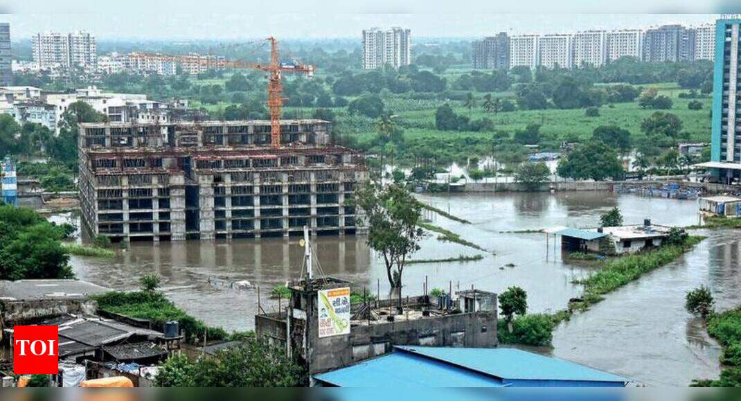 Heavy rain in Bardoli, Mithi Khadi starts swelling again | Surat News - Times of India