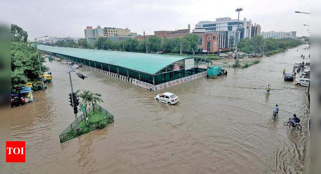 Helpless at home: Water floods basements, enters living rooms | Gurgaon ...