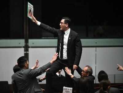 Two Hong Kong opposition lawmakers arrested over protests - Times of India