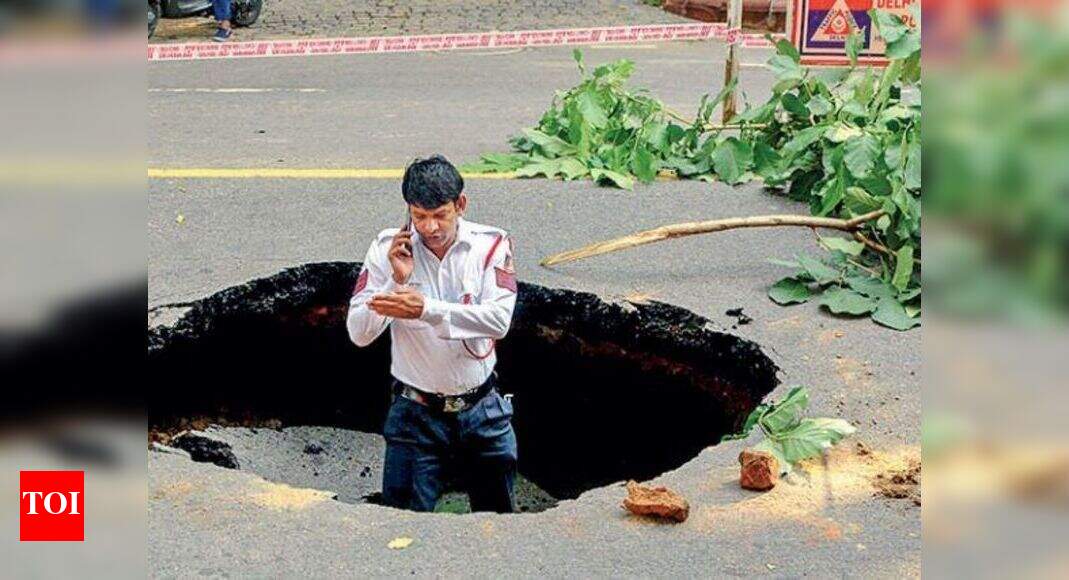 A hole in the centre of Delhi: When a large portion of road caved-in ...