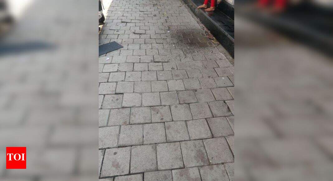 poor quality footpath - Times of India