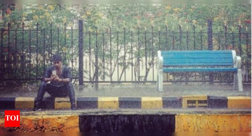 Actor Viraat enjoys fresh spell of city rain | Kannada Movie News ...