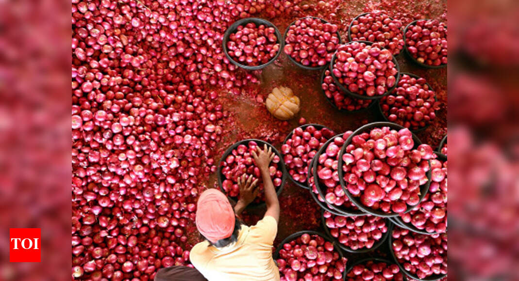 Nashik farmers halt auction as onion crashes | Nashik News - Times of India