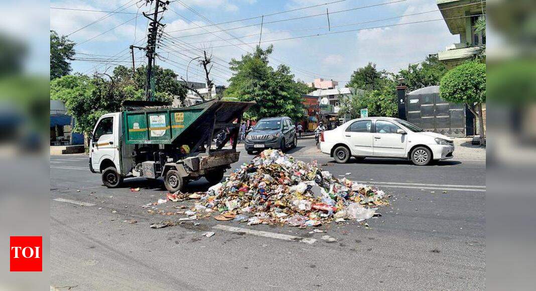 Noida waste vans targeted amid talks | Noida News - Times of India