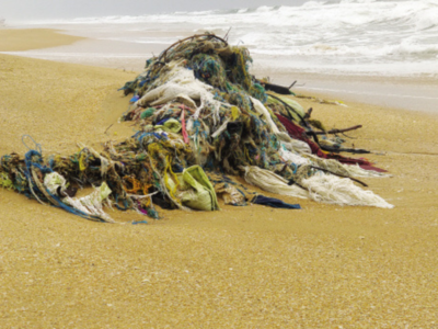 Mounds of uncleared entangled garbage getting buried in sand | Goa News ...