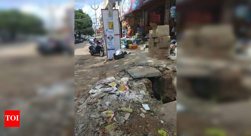 garbage and debris dumping on roads. - Times of India