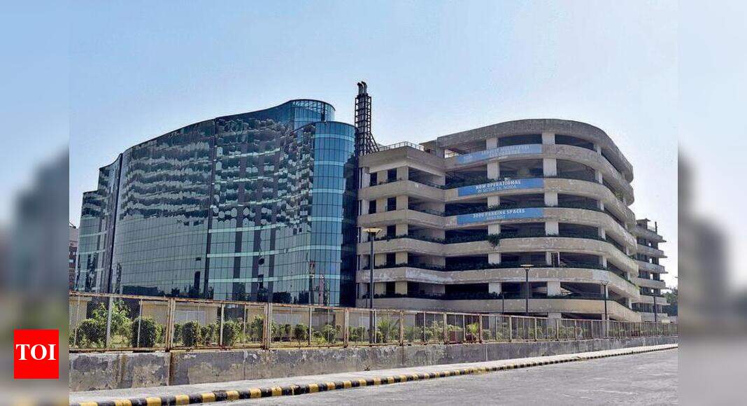 Noida: Days after reopening, only 200 use Sector 18 parking lot over ...