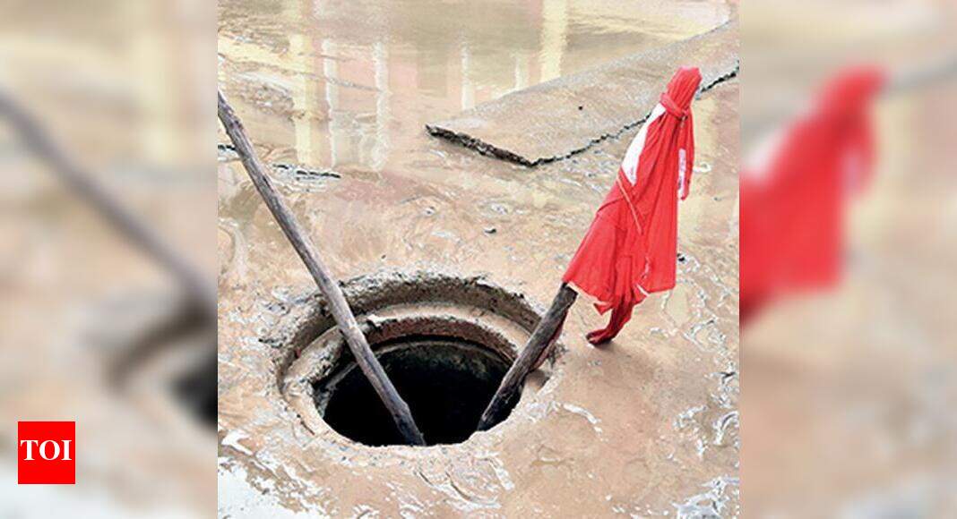 Missing manhole covers potential death traps during downpour ...