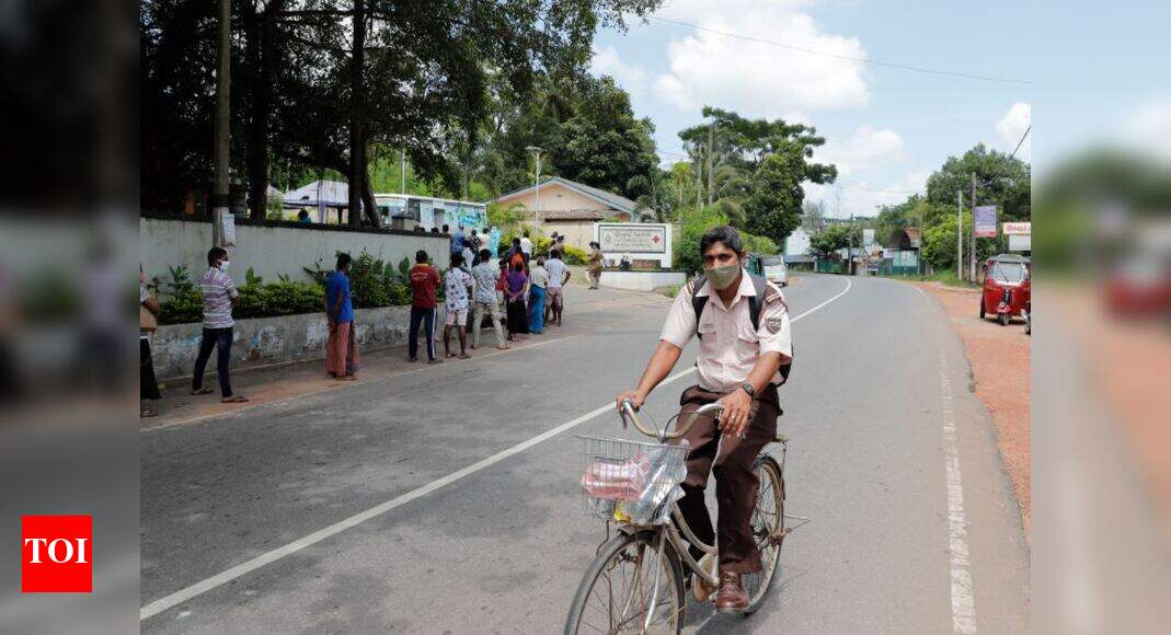 Sri Lanka increases coronavirus-curfew zones after spike in cases - Times of India