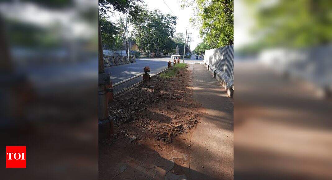 Damaged Pavement inviting accident - Times of India