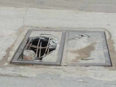 Big open uncovered manhole at Kondapur Signal - Times of India