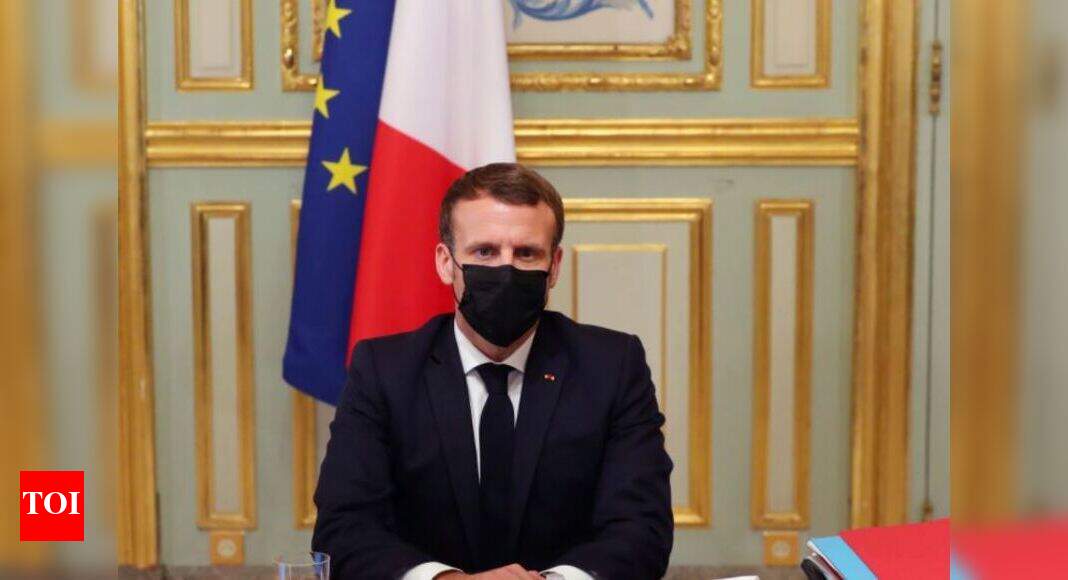 Battling two crises, Emmanuel Macron faces defining moment - Times of India