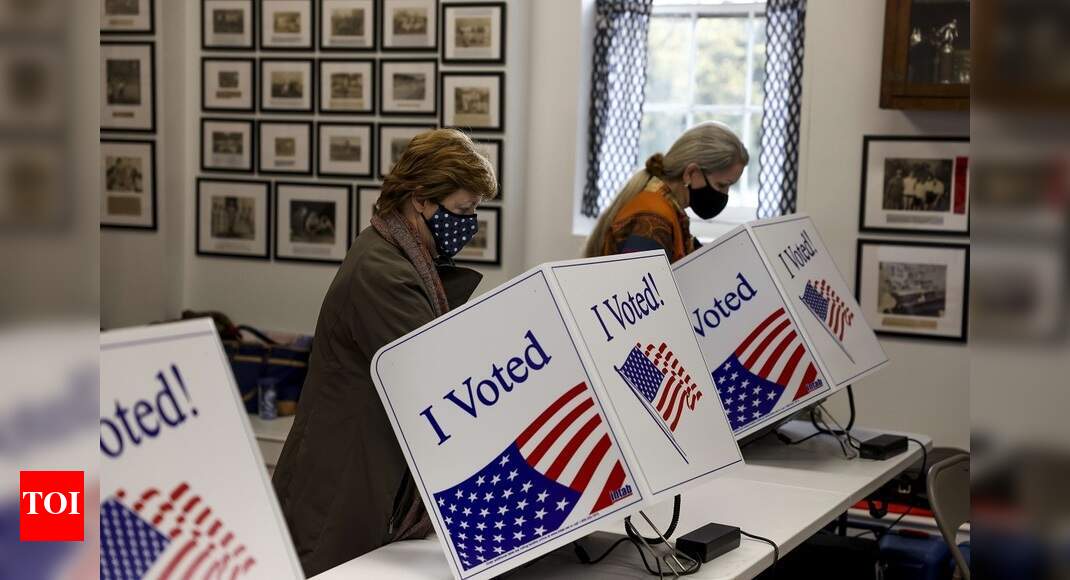 Long lines seen outside polling stations as Americans head to polls ...