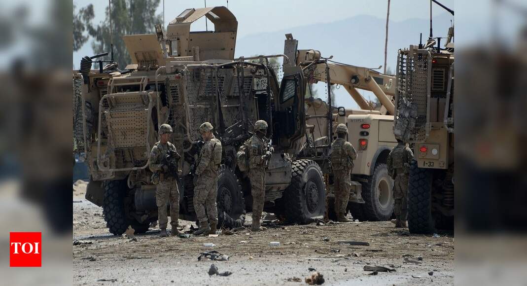 Taliban call on Biden to stick to US troop withdrawal deal - Times of India