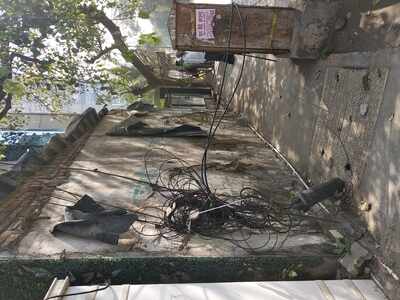Dangerous loose hanging cables - Times of India