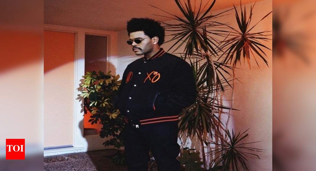 The Weeknd turns up with bandaged face at American Music Awards ...