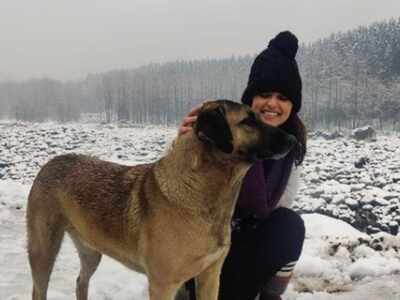 Maira Doshi poses with a canine, says, 'When life grows cold, a dog ...