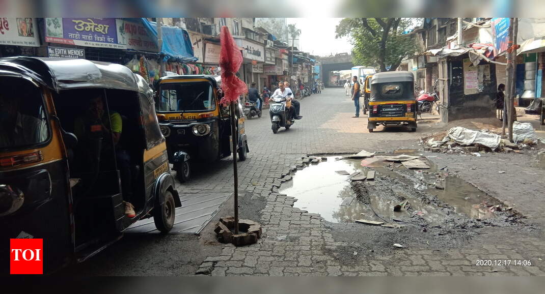 Potholes on the road. - Times of India