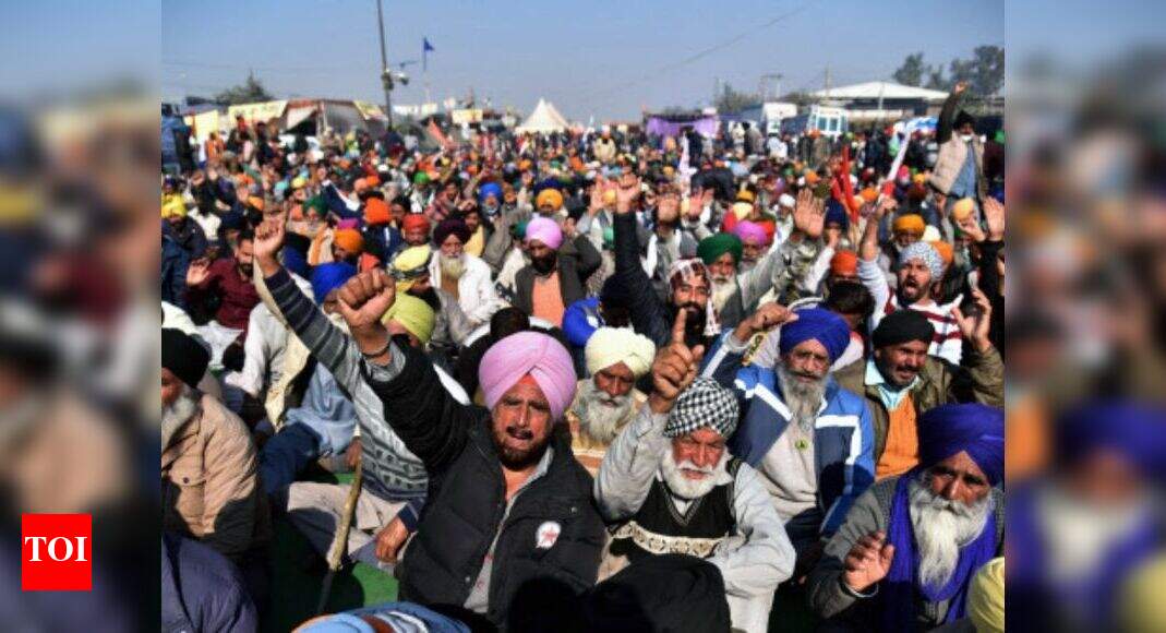 Farmers' protest: Youths ink protest tattoos at Singhu border | Delhi ...