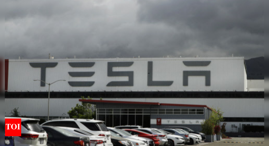 Tesla cars to soon have Apple, Amazon Music support - Times of India