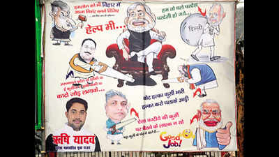 RJD poster shows Nitish Kumar being ‘downsized’ by BJP | Patna News ...