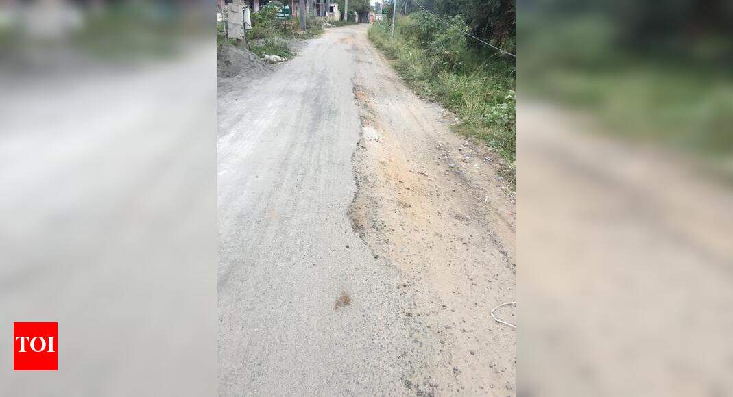 Fragile unstable access road into our colony - Times of India