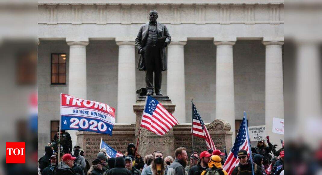 Protesters swarm Statehouses across US; some evacuated - Times of India