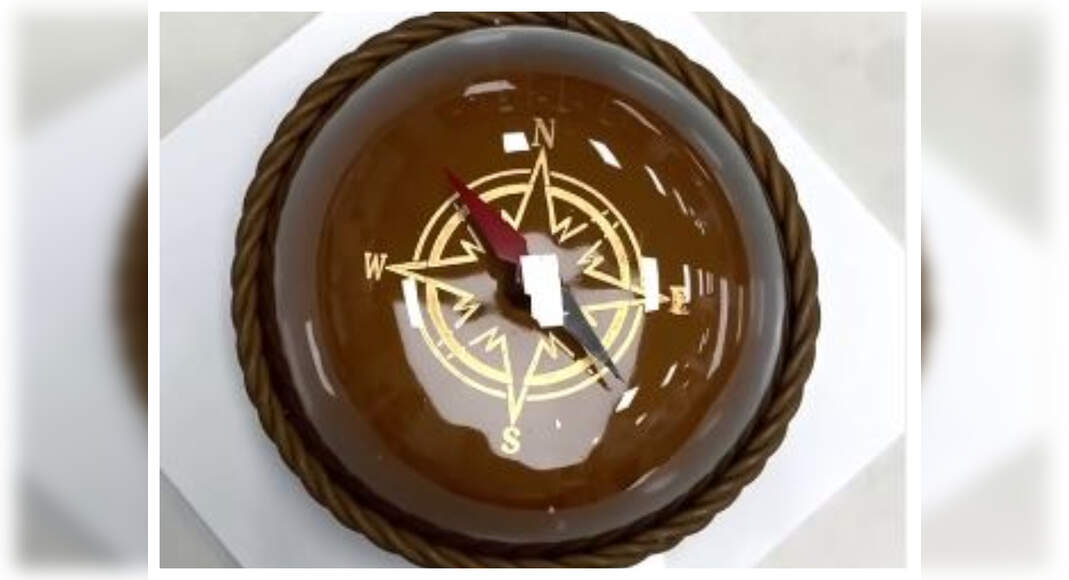 A glimpse of this chocolate compass with transparent sugar dome left ...
