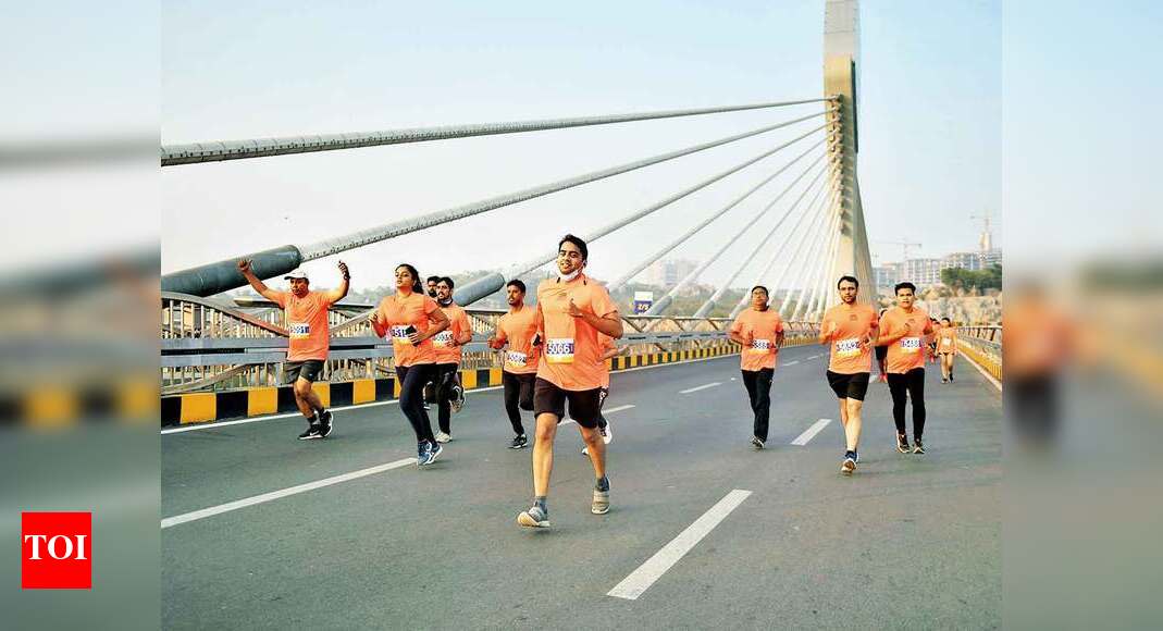 Cyber city comes alive as runners hit the streets amid pandemic ...