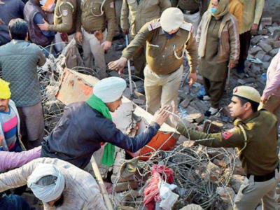 At Tikri Border, farmers run into new wall | Delhi News - Times of India