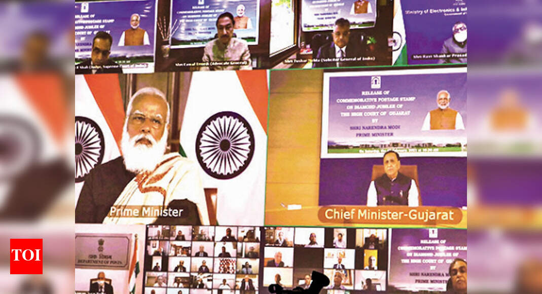 PM Narendra Modi releases postage stamp on Gujarat HC’s diamond jubilee ...