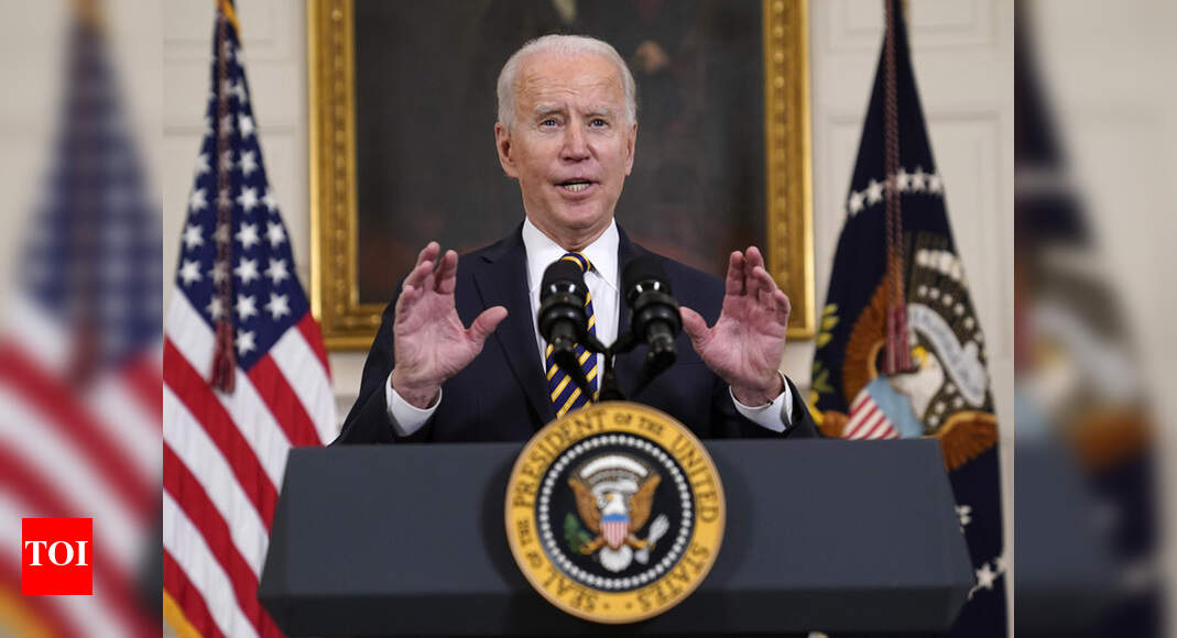 US President Joe Biden reverses green card ban - The Times of India
