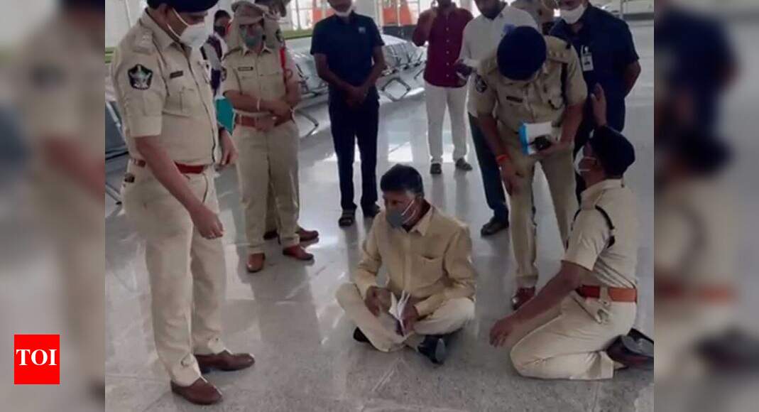 TDP chief N Chandrababu Naidu squats on floor after police detain him at Tirupati airport ...