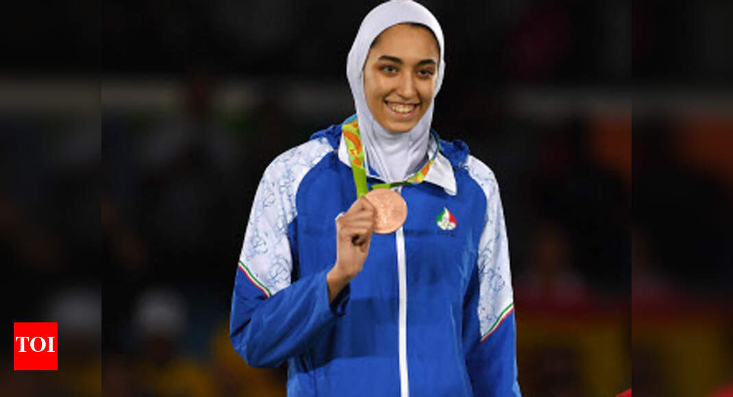 Iran's only female Olympic medallist to compete under white flag in ...