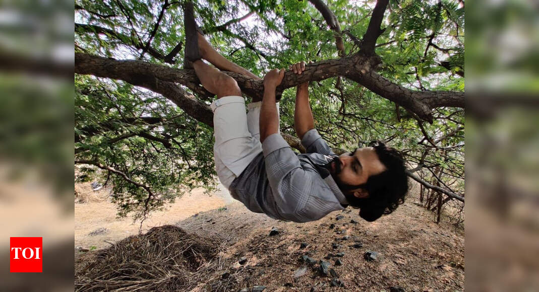 Karthi climbs his favourite Puliyamaram | Tamil Movie News - Times of India