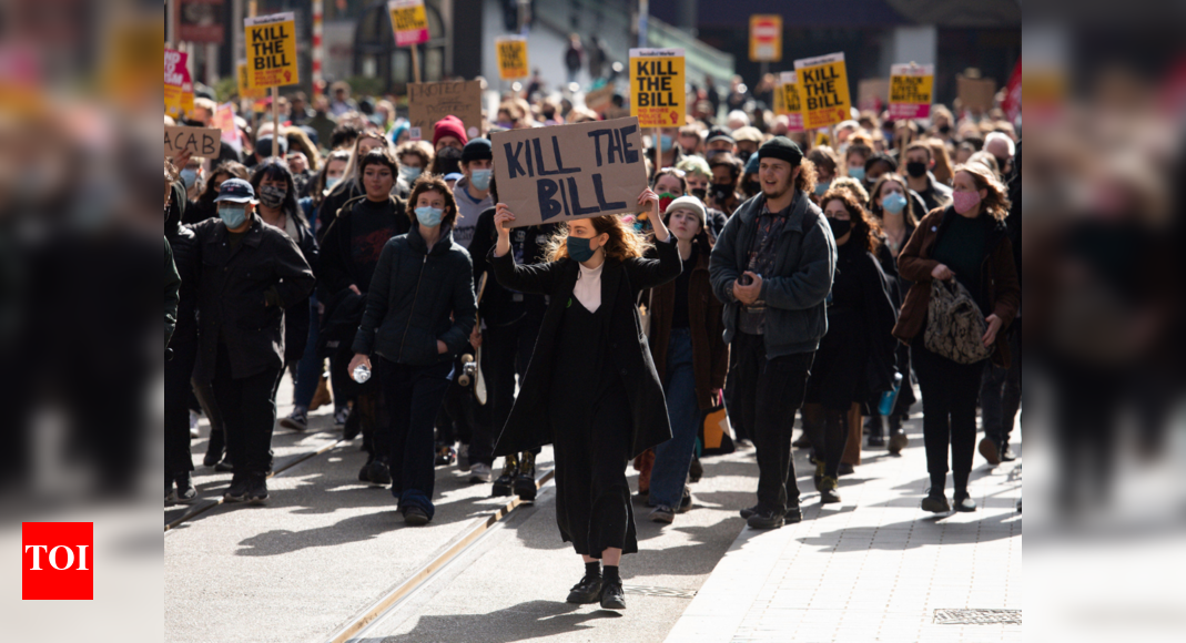 Germans protest in thousands against virus curbs - Times of India
