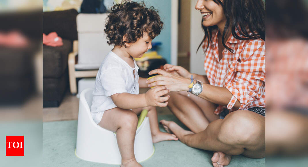 What baby's poop colour says about his health - The Times of India