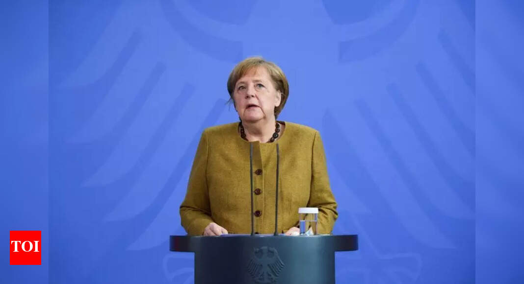 Angela Merkel defends 'tough' emergency Covid-19 measures - Times of India