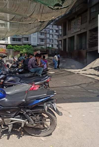 Encroachment by Builder using construction debris - Times of India