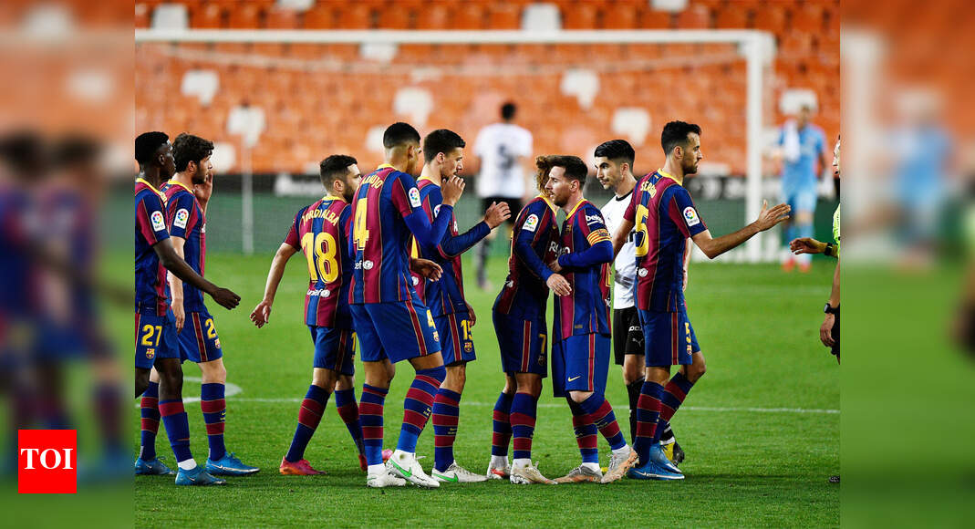 Lionel Messi double leads Barca to nail-biting win over Valencia ...