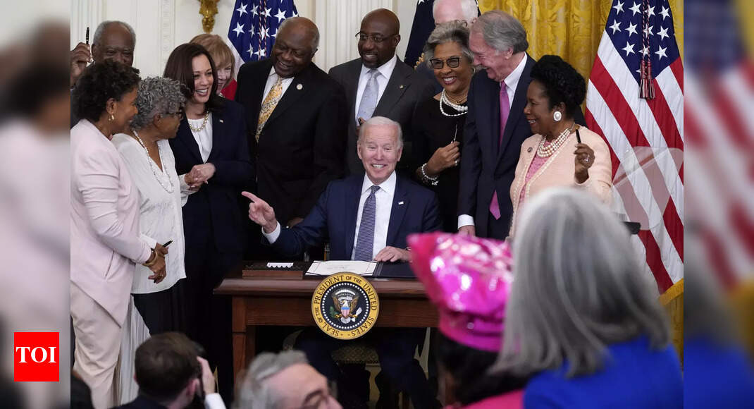 Biden signs bill making Juneteenth a federal holiday - Times of India