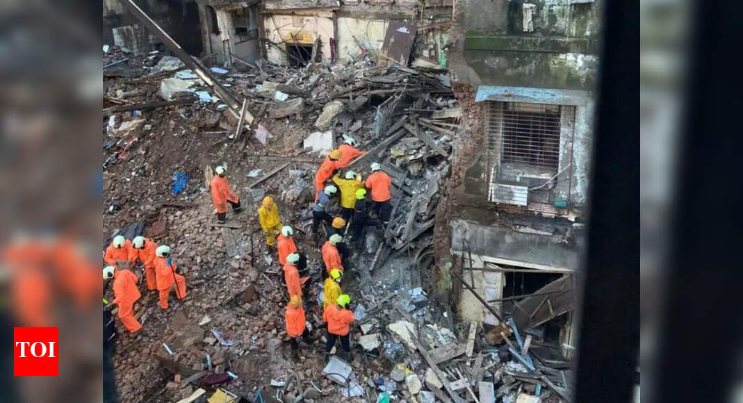 Surat: Teen rescued after portion of building collapses | Surat News ...