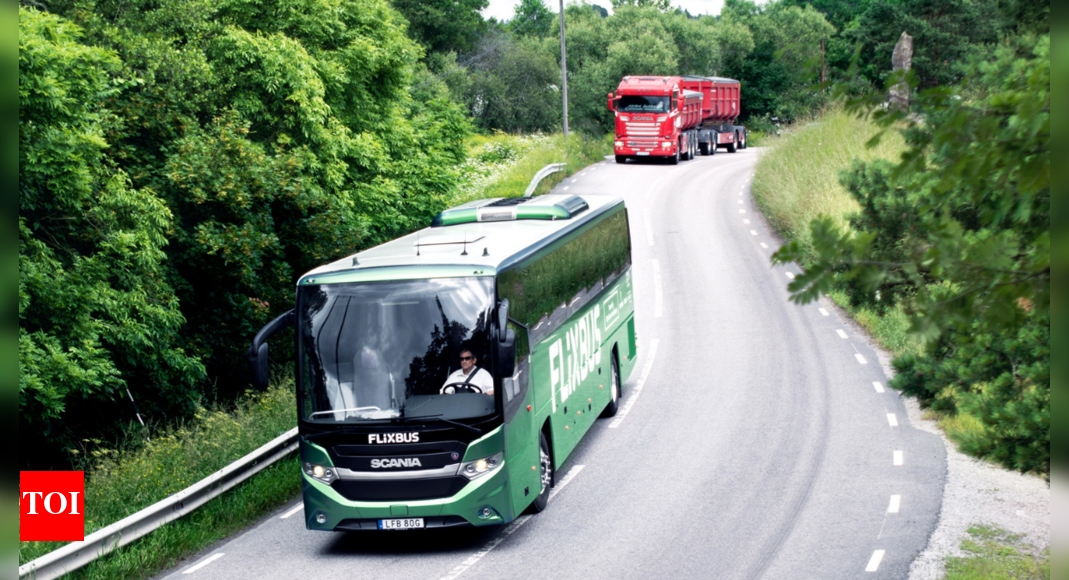 Scania unveils long-distance biogas-powered bus - Times of India
