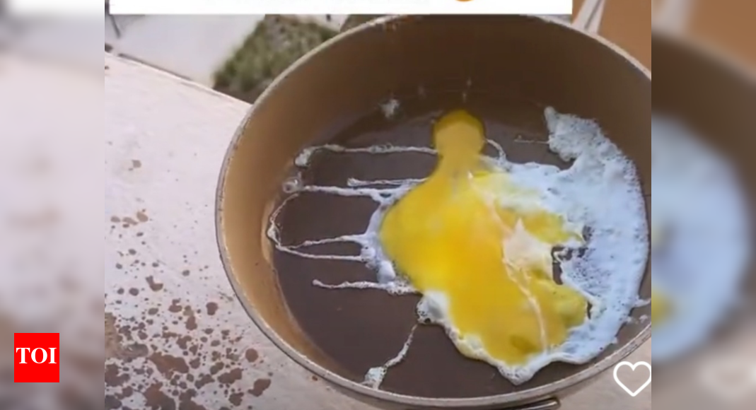 Viral video shows a woman cooking food in the Sun’s heat - Times of India