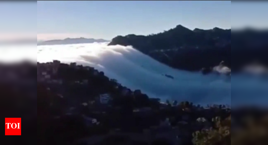 Viral video shows clouds descending mountains - Times of India