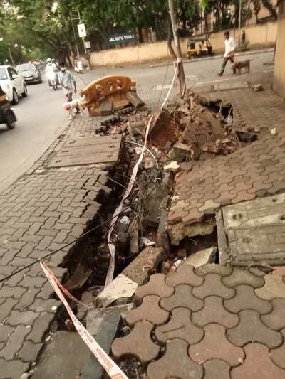 footpath damage - Times of India