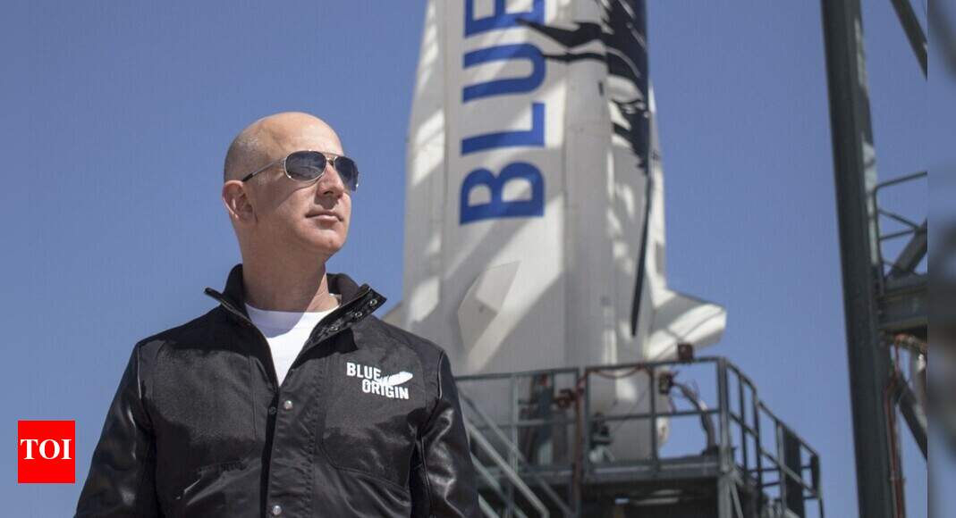 Jeff Bezos riding own rocket on company's first flight with people ...