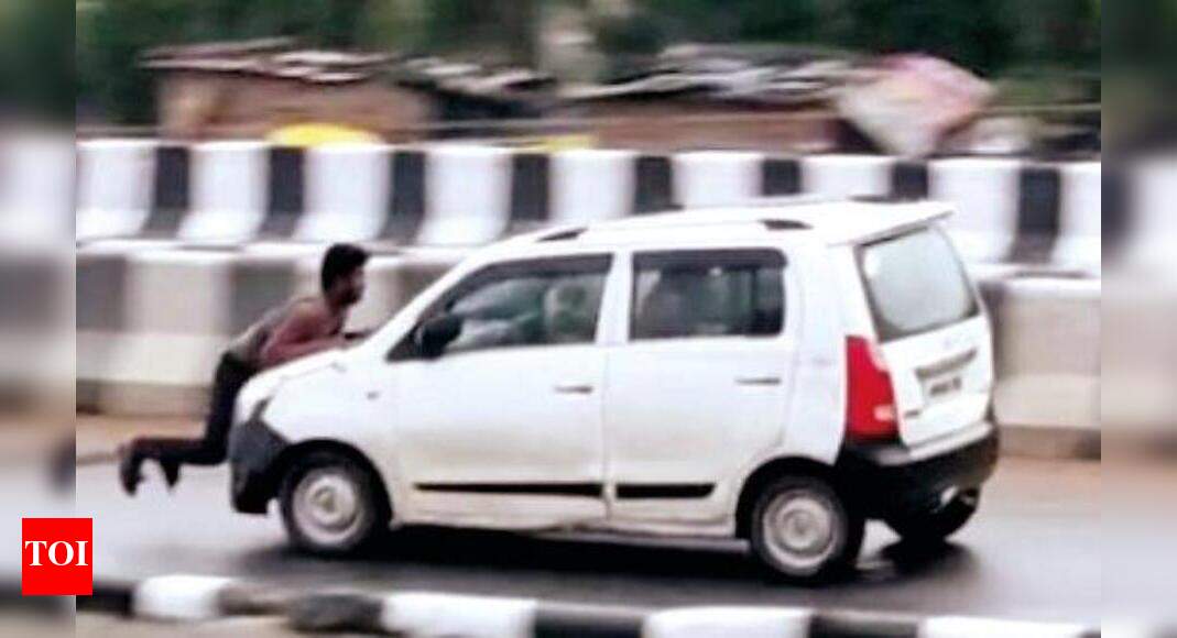 Man clings on to car bonnet in road rage case, taken for a 5Km forced ...