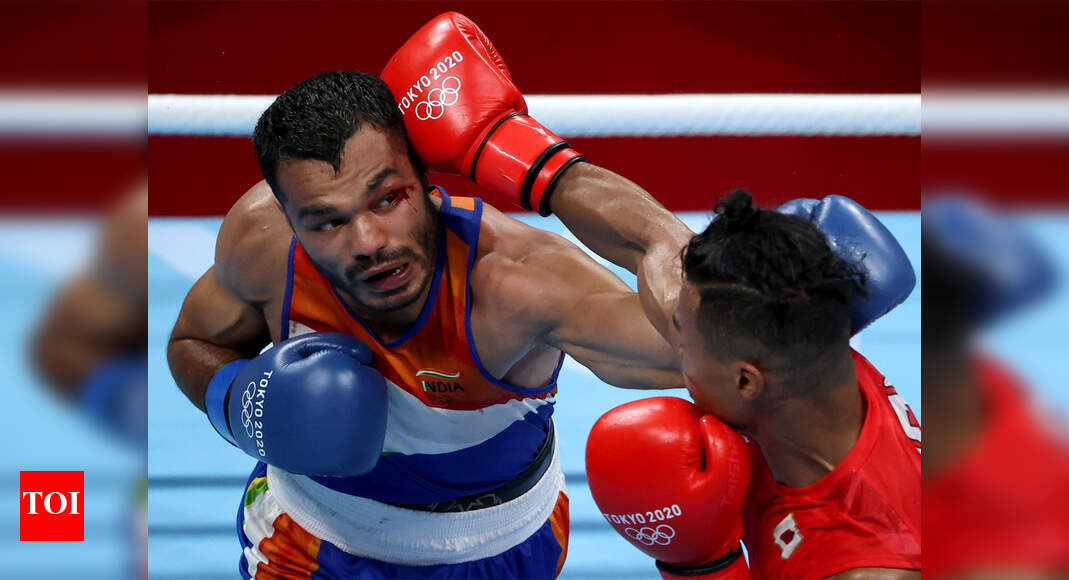 Tokyo Olympics: Carrying a shoulder injury, Vikas Krishan crashes out ...