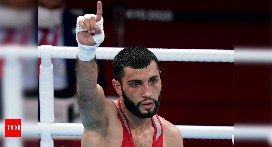 Tokyo Olympics: Uzbek boxer Zoirov begins title defence with routine ...